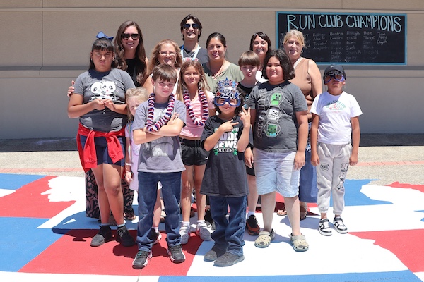Students refresh Virginia Peterson mural for national anniversary ...